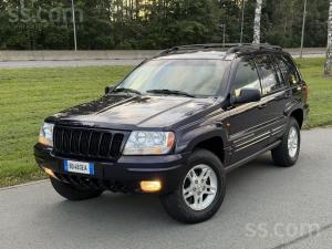 Violets Jeep Grand Cherokee 2000 Rīga, ar dzinēja tilpumu 3.10 L un nobraukumu 0 tūkst. km par 9900 €, foto 10 vietnē AUTOMOTO.COM.LV