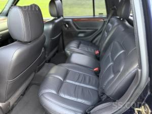 Violets Jeep Grand Cherokee 2000 Rīga, ar dzinēja tilpumu 3.10 L un nobraukumu 0 tūkst. km par 9900 €, foto 12 vietnē AUTOMOTO.COM.LV