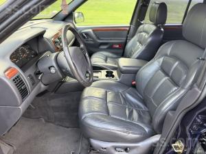Violets Jeep Grand Cherokee 2000 Rīga, ar dzinēja tilpumu 3.10 L un nobraukumu 0 tūkst. km par 9900 €, foto 13 vietnē AUTOMOTO.COM.LV