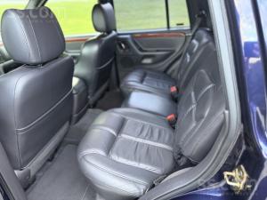 Violets Jeep Grand Cherokee 2000 Rīga, ar dzinēja tilpumu 3.10 L un nobraukumu 0 tūkst. km par 9900 €, foto 15 vietnē AUTOMOTO.COM.LV