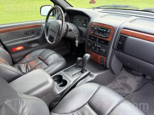 Violets Jeep Grand Cherokee 2000 Rīga, ar dzinēja tilpumu 3.10 L un nobraukumu 0 tūkst. km par 9900 €, foto 17 vietnē AUTOMOTO.COM.LV