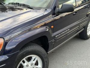 Violets Jeep Grand Cherokee 2000 Rīga, ar dzinēja tilpumu 3.10 L un nobraukumu 0 tūkst. km par 9900 €, foto 22 vietnē AUTOMOTO.COM.LV