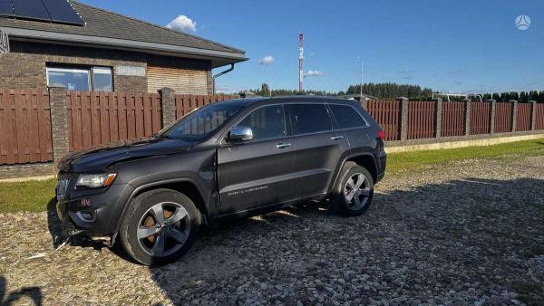 Violets Jeep Grand Cherokee 2014 Utena, ar dzinēja tilpumu 3.60 L un nobraukumu 318 tūkst. km par 7300 €, foto 1 vietnē AUTOMOTO.COM.LV