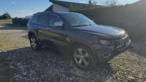Violets Jeep Grand Cherokee 2014 Utena, ar dzinēja tilpumu 3.60 L un nobraukumu 318 tūkst. km par 7300 €, foto 3 vietnē AUTOMOTO.COM.LV