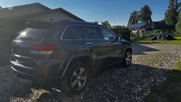 Violets Jeep Grand Cherokee 2014 Utena, ar dzinēja tilpumu 3.60 L un nobraukumu 318 tūkst. km par 7300 €, foto 4 vietnē AUTOMOTO.COM.LV