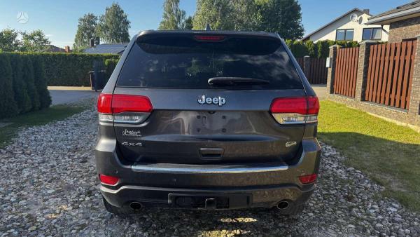 Violets Jeep Grand Cherokee 2014 Utena, ar dzinēja tilpumu 3.60 L un nobraukumu 318 tūkst. km par 7300 €, foto 5 vietnē AUTOMOTO.COM.LV