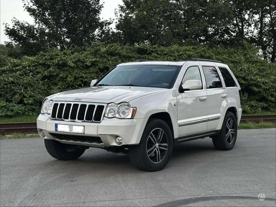 Balts Jeep Grand Cherokee 2008 Kauņa, ar dzinēja tilpumu 5.70 L un nobraukumu 392 tūkst. km par 7500 €, foto 1 vietnē AUTOMOTO.COM.LV