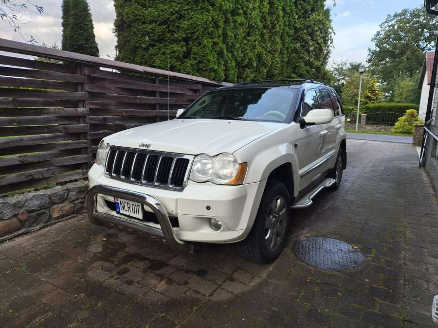 Balts Jeep Grand Cherokee 2008 Viļņa, ar dzinēja tilpumu 5.65 L un nobraukumu 304 tūkst. km par 7500 €, foto 1 vietnē AUTOMOTO.COM.LV