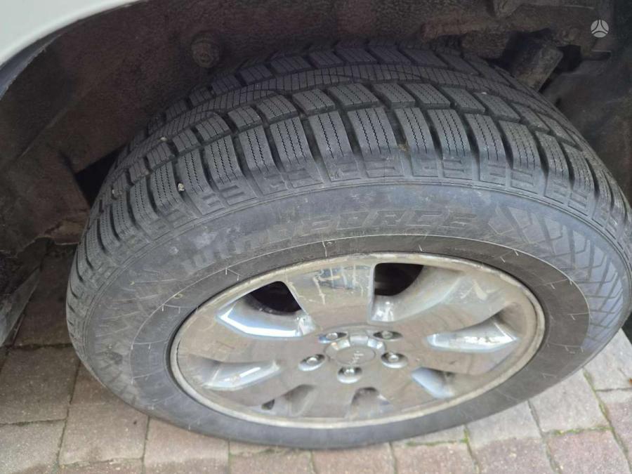 Balts Jeep Grand Cherokee 2008 Viļņa, ar dzinēja tilpumu 5.65 L un nobraukumu 304 tūkst. km par 7500 €, foto 11 vietnē AUTOMOTO.COM.LV