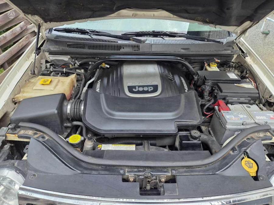 Balts Jeep Grand Cherokee 2008 Viļņa, ar dzinēja tilpumu 5.65 L un nobraukumu 304 tūkst. km par 7500 €, foto 15 vietnē AUTOMOTO.COM.LV