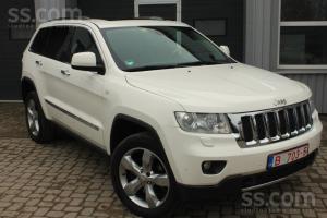 White Jeep Grand Cherokee 2011 in Riga, with an engine capacity of 5.70 L and mileage of 0 thousand km for 12990 €, photo 5 on AUTOMOTO.COM.LV