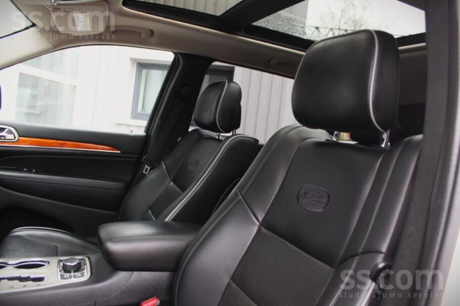 White Jeep Grand Cherokee 2011 in Riga, with an engine capacity of 5.70 L and mileage of 0 thousand km for 12990 €, photo 17 on AUTOMOTO.COM.LV