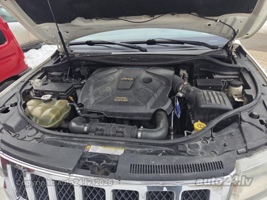 White Jeep Grand Cherokee 2011 in Tallinn, with an engine capacity of 3.00 L and mileage of 253 thousand km for 7000 €, photo 21 on AUTOMOTO.COM.LV