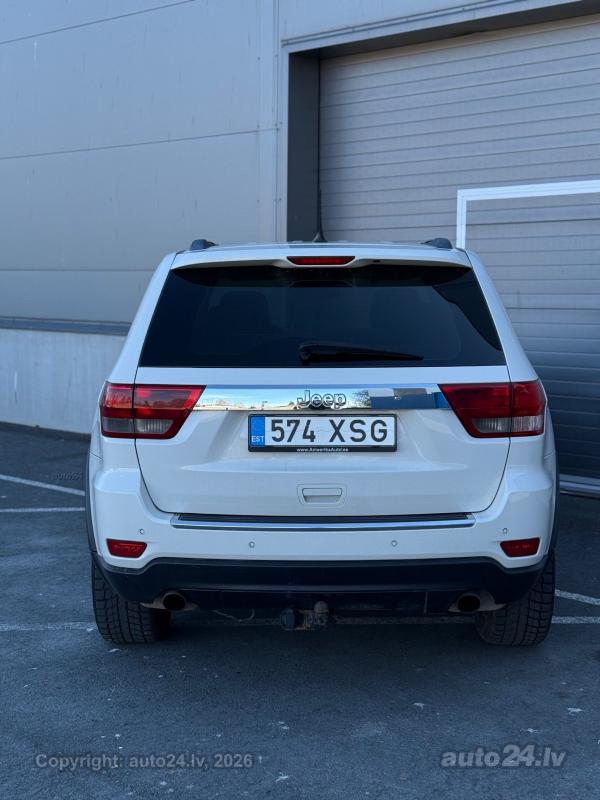 White Jeep Grand Cherokee 2011 in Tartu, with an engine capacity of 3.00 L and mileage of 310 thousand km for 7500 €, photo 5 on AUTOMOTO.COM.LV