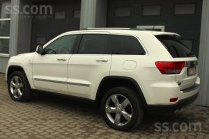 White Jeep Grand Cherokee 2011 in Riga, with an engine capacity of 5.70 L and mileage of 0 thousand km for 11990 €, photo 4 on AUTOMOTO.COM.LV