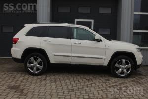 White Jeep Grand Cherokee 2011 in Riga, with an engine capacity of 5.70 L and mileage of 0 thousand km for 11990 €, photo 8 on AUTOMOTO.COM.LV