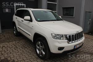White Jeep Grand Cherokee 2011 in Riga, with an engine capacity of 5.70 L and mileage of 0 thousand km for 11990 €, photo 9 on AUTOMOTO.COM.LV