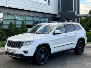 White Jeep Grand Cherokee 2011 in Riga, with an engine capacity of 3.00 L and mileage of 259 thousand km for 6750 €, photo  on AUTOMOTO.COM.LV