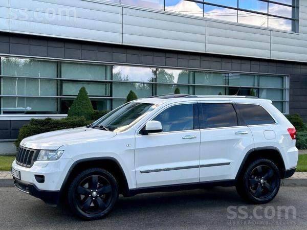 Balts Jeep Grand Cherokee 2011 Rīga, ar dzinēja tilpumu 3.00 L un nobraukumu 259 tūkst. km par 6750 €, foto 4 vietnē AUTOMOTO.COM.LV