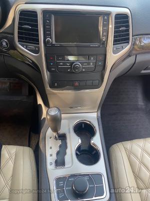 White Jeep Grand Cherokee 2012 in Tallinn, with an engine capacity of 3.00 L and mileage of 274 thousand km for 9000 €, photo 12 on AUTOMOTO.COM.LV