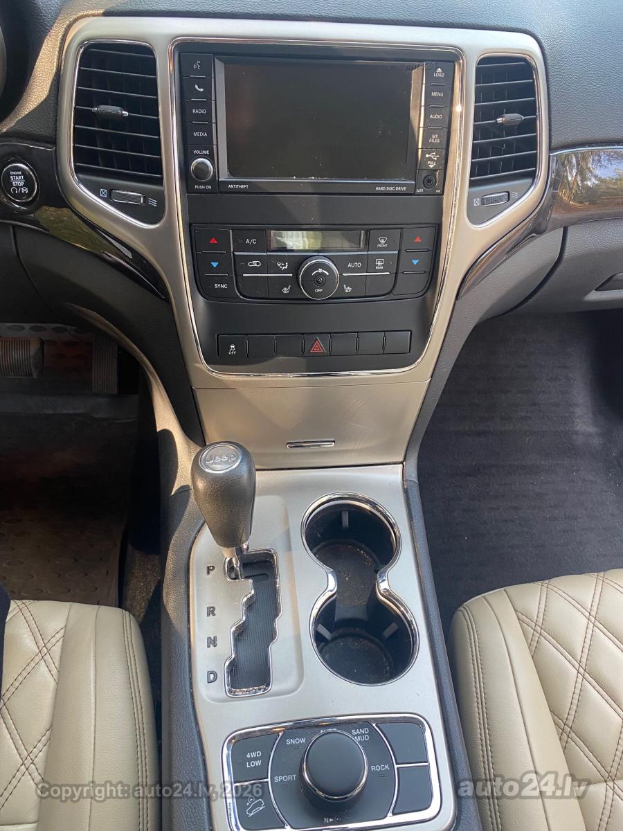 White Jeep Grand Cherokee 2012 in Tallinn, with an engine capacity of 3.00 L and mileage of 274 thousand km for 9000 €, photo 12 on AUTOMOTO.COM.LV