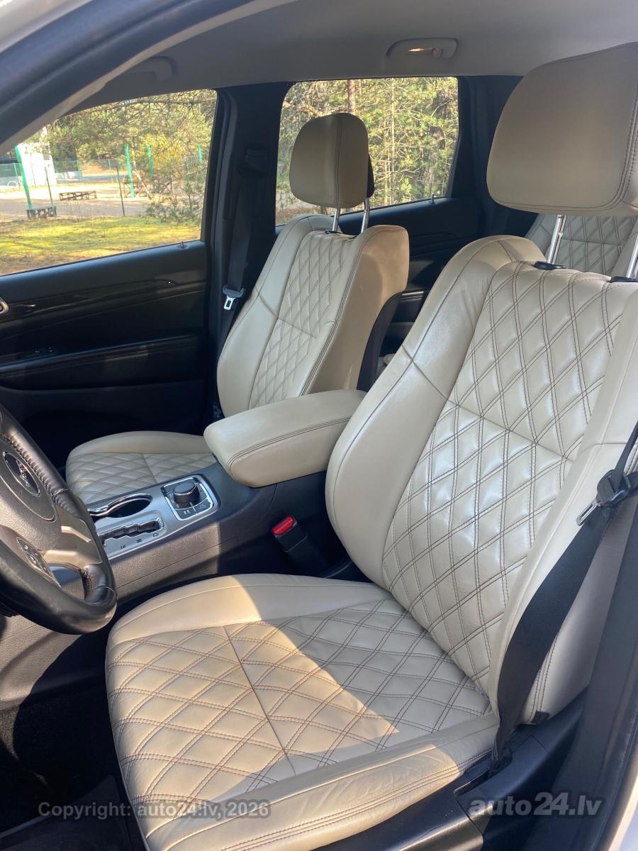 White Jeep Grand Cherokee 2012 in Tallinn, with an engine capacity of 3.00 L and mileage of 274 thousand km for 9000 €, photo 14 on AUTOMOTO.COM.LV