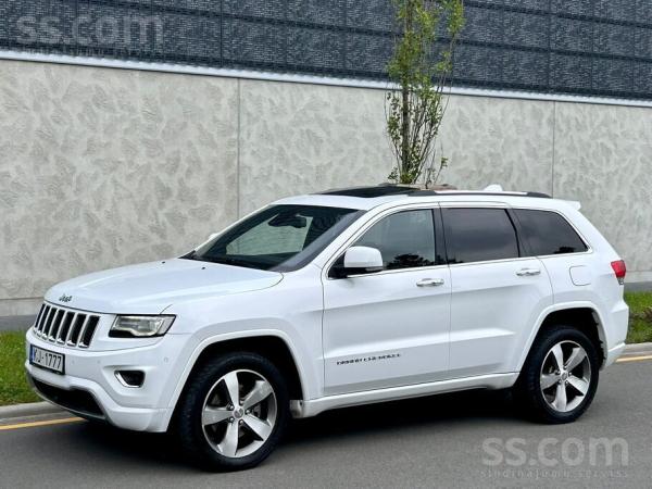 White Jeep Grand Cherokee 2013 in Riga, with an engine capacity of 3.00 L and mileage of 0 thousand km for 9450 €, photo 2 on AUTOMOTO.COM.LV