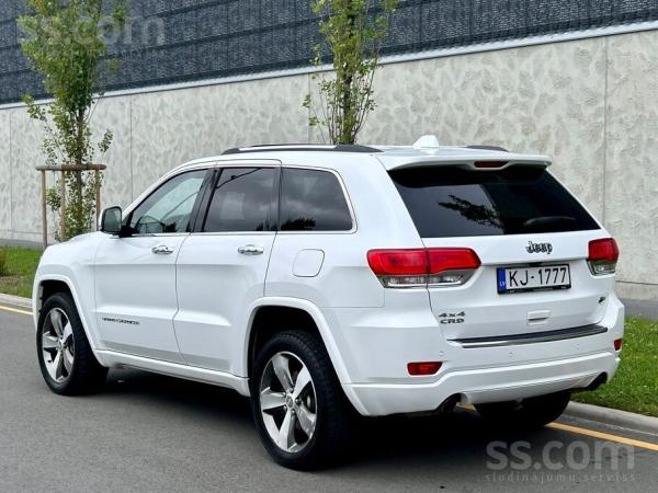 White Jeep Grand Cherokee 2013 in Riga, with an engine capacity of 3.00 L and mileage of 0 thousand km for 9450 €, photo 4 on AUTOMOTO.COM.LV