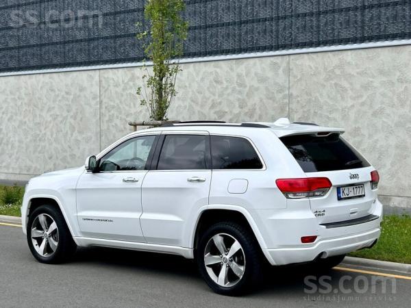 White Jeep Grand Cherokee 2013 in Riga, with an engine capacity of 3.00 L and mileage of 0 thousand km for 9450 €, photo 5 on AUTOMOTO.COM.LV