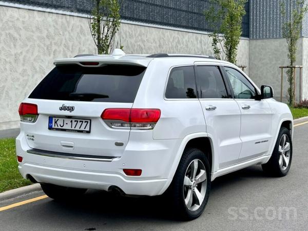 White Jeep Grand Cherokee 2013 in Riga, with an engine capacity of 3.00 L and mileage of 0 thousand km for 9450 €, photo 10 on AUTOMOTO.COM.LV