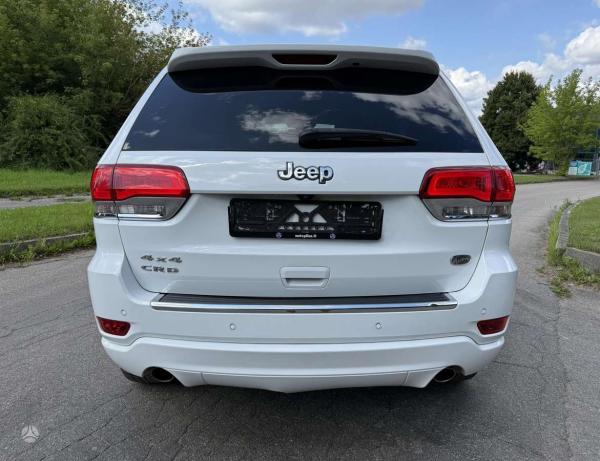 White Jeep Grand Cherokee 2013 in Siauliai, with an engine capacity of 2.99 L and mileage of 235 thousand km for 12700 €, photo 6 on AUTOMOTO.COM.LV