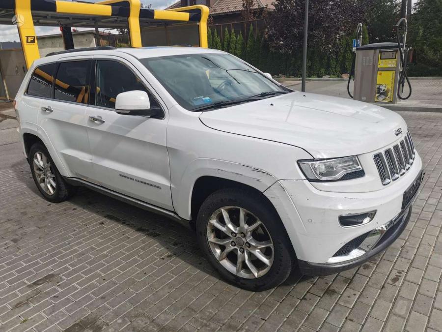 White Jeep Grand Cherokee 2013 in Kaunas, with an engine capacity of 2.99 L and mileage of 235 thousand km for 6300 €, photo 5 on AUTOMOTO.COM.LV