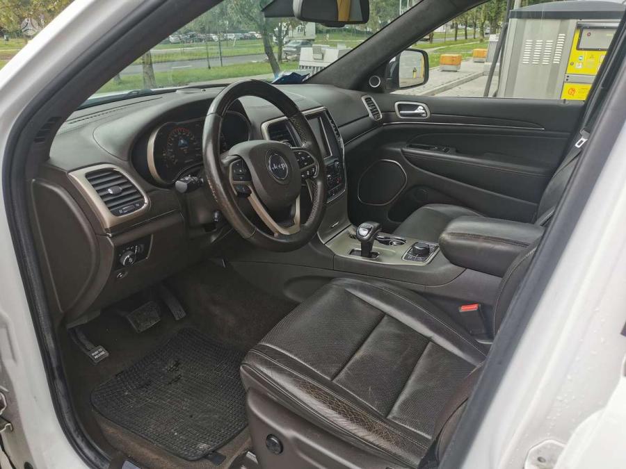 White Jeep Grand Cherokee 2013 in Kaunas, with an engine capacity of 2.99 L and mileage of 235 thousand km for 6300 €, photo 13 on AUTOMOTO.COM.LV