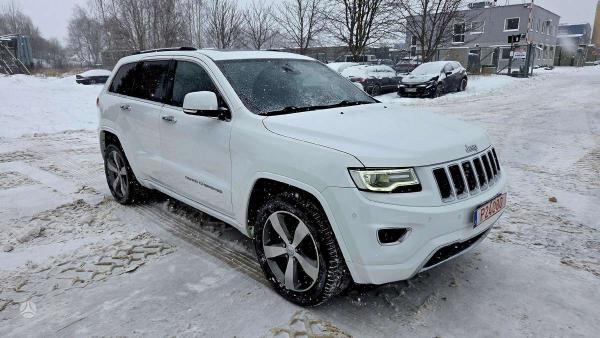 White Jeep Grand Cherokee 2014 in Siauliai, with an engine capacity of 2.99 L and mileage of 128 thousand km for 11900 €, photo 4 on AUTOMOTO.COM.LV