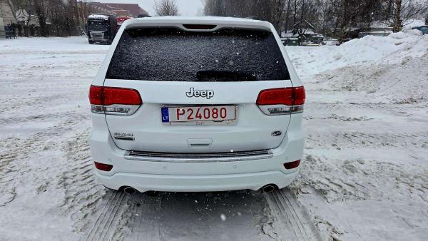 White Jeep Grand Cherokee 2014 in Siauliai, with an engine capacity of 2.99 L and mileage of 128 thousand km for 11900 €, photo 7 on AUTOMOTO.COM.LV