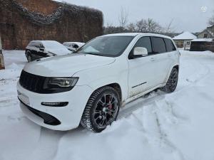 Balts Jeep Grand Cherokee 2014 Kauņa, ar dzinēja tilpumu 6.42 L un nobraukumu 230 tūkst. km par 22000 €, foto  vietnē AUTOMOTO.COM.LV
