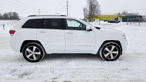 Balts Jeep Grand Cherokee 2014 Šauļi, ar dzinēja tilpumu 2.99 L un nobraukumu 128 tūkst. km par 12500 €, foto 5 vietnē AUTOMOTO.COM.LV