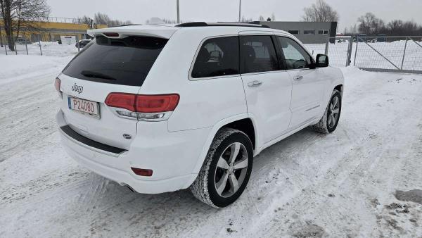 Balts Jeep Grand Cherokee 2014 Šauļi, ar dzinēja tilpumu 2.99 L un nobraukumu 128 tūkst. km par 12500 €, foto 6 vietnē AUTOMOTO.COM.LV