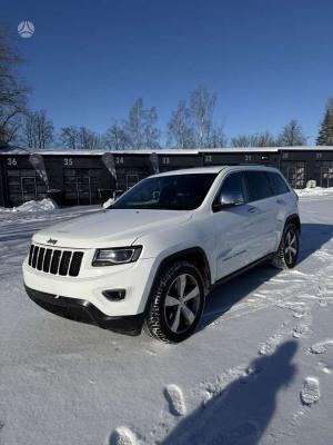 White Jeep Grand Cherokee 2014 in Siauliai, with an engine capacity of 3.00 L and mileage of 217 thousand km for 12000 €, photo 2 on AUTOMOTO.COM.LV