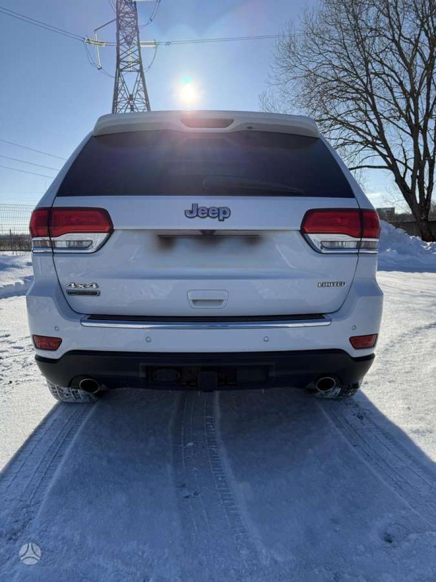 White Jeep Grand Cherokee 2014 in Siauliai, with an engine capacity of 3.00 L and mileage of 217 thousand km for 12000 €, photo 6 on AUTOMOTO.COM.LV