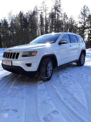 White Jeep Grand Cherokee 2014 in Svencionys, with an engine capacity of 3.60 L and mileage of 291 thousand km for 13900 €, photo  on AUTOMOTO.COM.LV