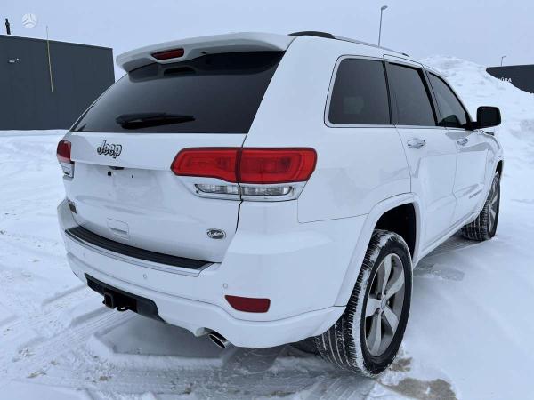 White Jeep Grand Cherokee 2014 in Siauliai, with an engine capacity of 3.60 L and mileage of 210 thousand km for 8400 €, photo 4 on AUTOMOTO.COM.LV