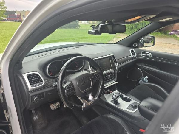 White Jeep Grand Cherokee 2014 in Kaunas, with an engine capacity of 6.40 L and mileage of 240 thousand km for 20000 €, photo 3 on AUTOMOTO.COM.LV