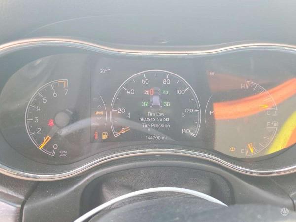 White Jeep Grand Cherokee 2014 in Klaipeda, with an engine capacity of 3.60 L and mileage of 232 thousand km for 8200 €, photo 10 on AUTOMOTO.COM.LV