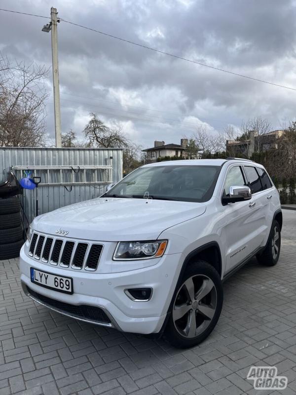 White Jeep Grand Cherokee 2015 in Vilnius, with an engine capacity of 3.60 L and mileage of 159 thousand km for 15500 €, photo 1 on AUTOMOTO.COM.LV