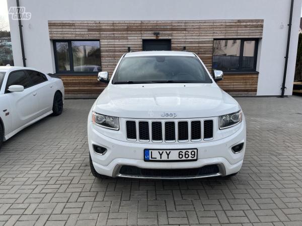 White Jeep Grand Cherokee 2015 in Vilnius, with an engine capacity of 3.60 L and mileage of 159 thousand km for 15500 €, photo 2 on AUTOMOTO.COM.LV