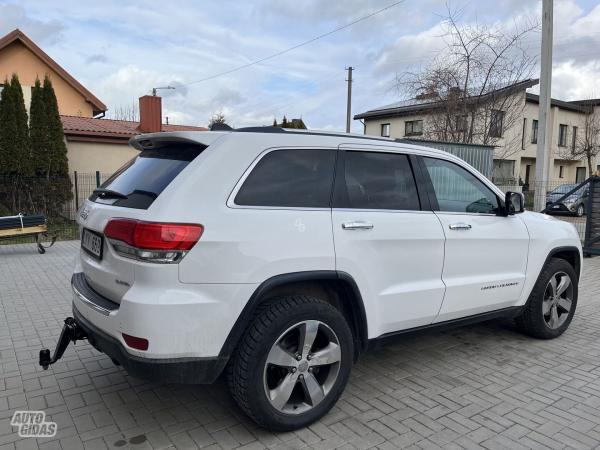 White Jeep Grand Cherokee 2015 in Vilnius, with an engine capacity of 3.60 L and mileage of 159 thousand km for 15500 €, photo 4 on AUTOMOTO.COM.LV