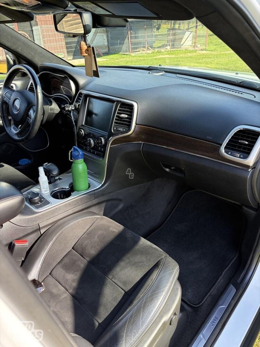 Balts Jeep Grand Cherokee 2015 Kauņa, ar dzinēja tilpumu 5.70 L un nobraukumu 241 tūkst. km par 15600 €, foto 8 vietnē AUTOMOTO.COM.LV
