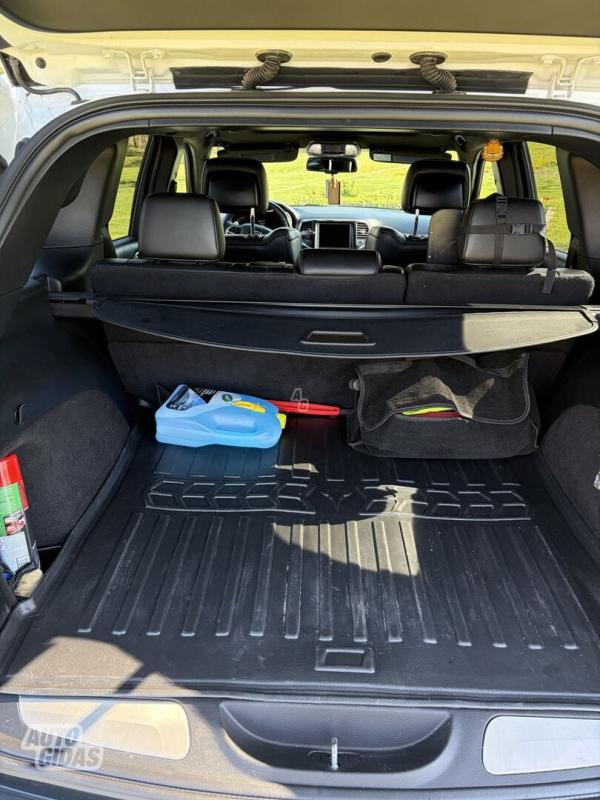 White Jeep Grand Cherokee 2015 in Kaunas, with an engine capacity of 5.70 L and mileage of 241 thousand km for 15600 €, photo 10 on AUTOMOTO.COM.LV