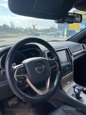 White Jeep Grand Cherokee 2015 in Tallinn, with an engine capacity of 3.00 L and mileage of 94 thousand km for 16490 €, photo 8 on AUTOMOTO.COM.LV